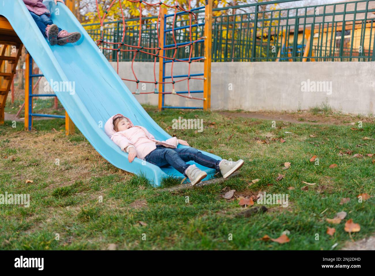 Sliding children hi-res stock photography and images - Alamy