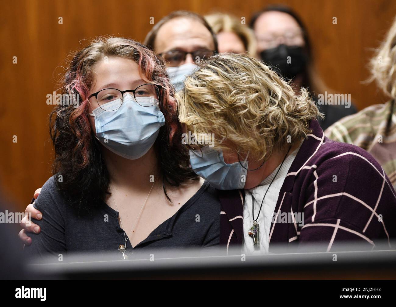 Sandra Cunningham of Oxford comforts her daughter Phoebe Arthur,15, who ...