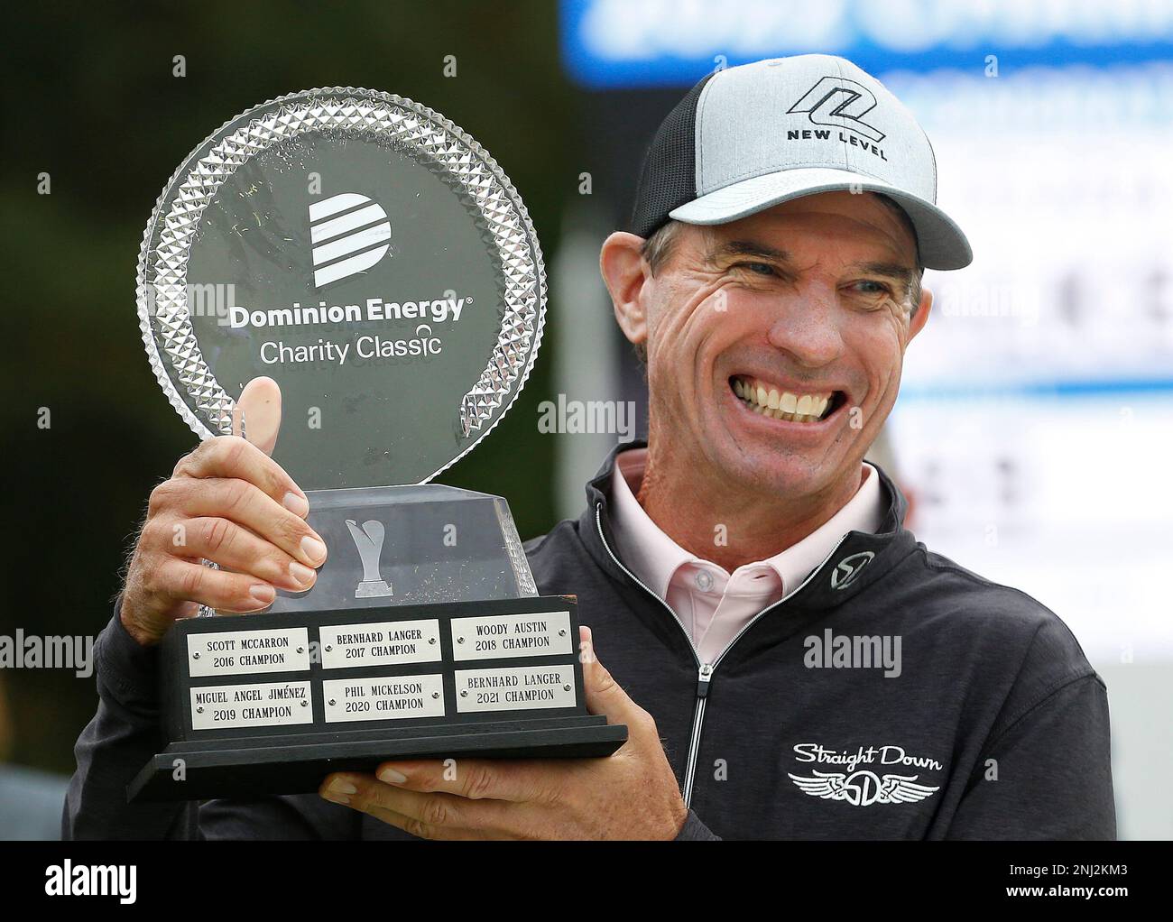 Steven Alker lifts the trophy after winning the Dominion Energy Charity ...