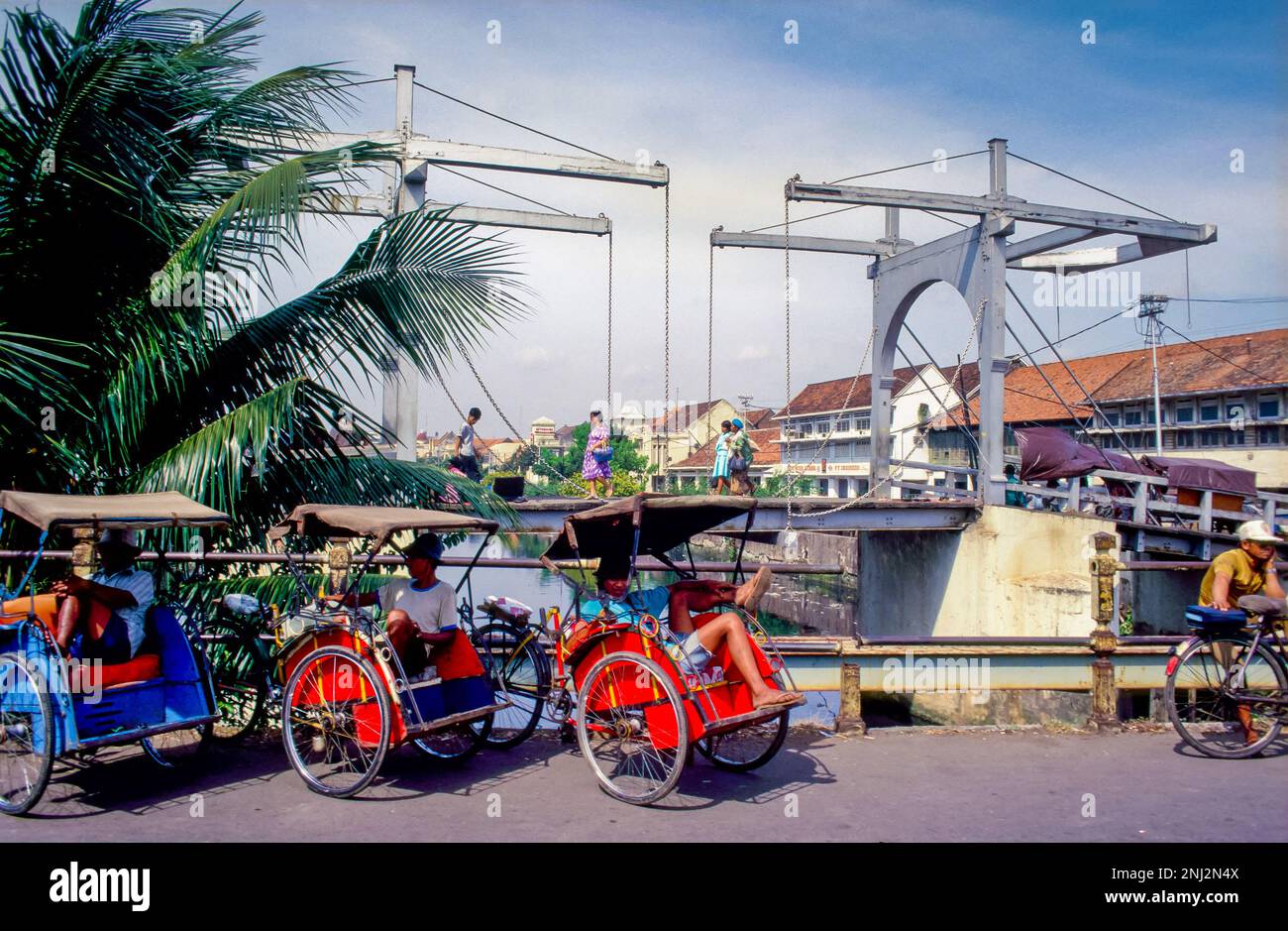 Indonesia, Jakarta. Rickshaws in front of a Dutch drawbridge Stock ...