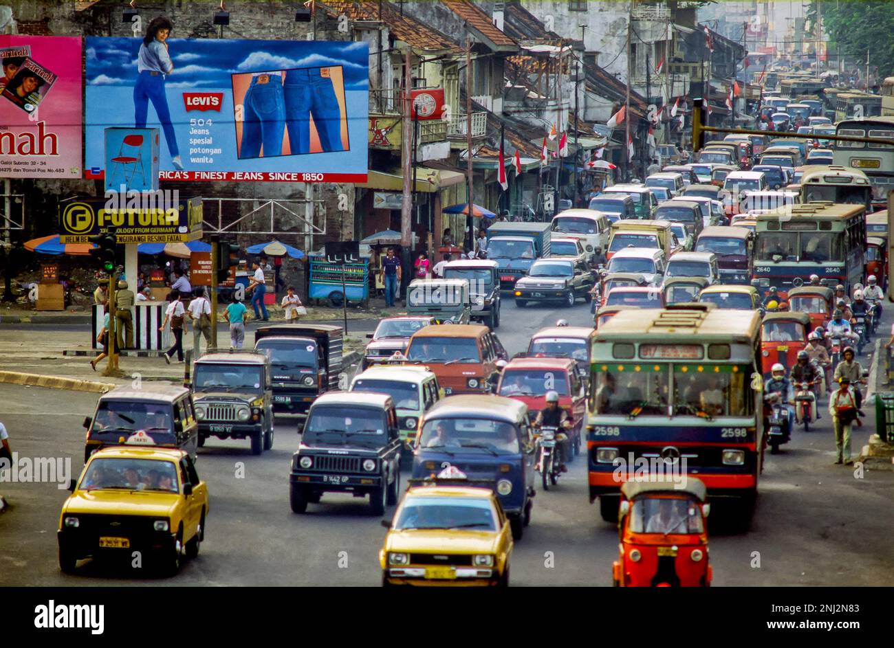 Indonesia, Jakarta. Levi's ad and traffic jam Stock Photo - Alamy