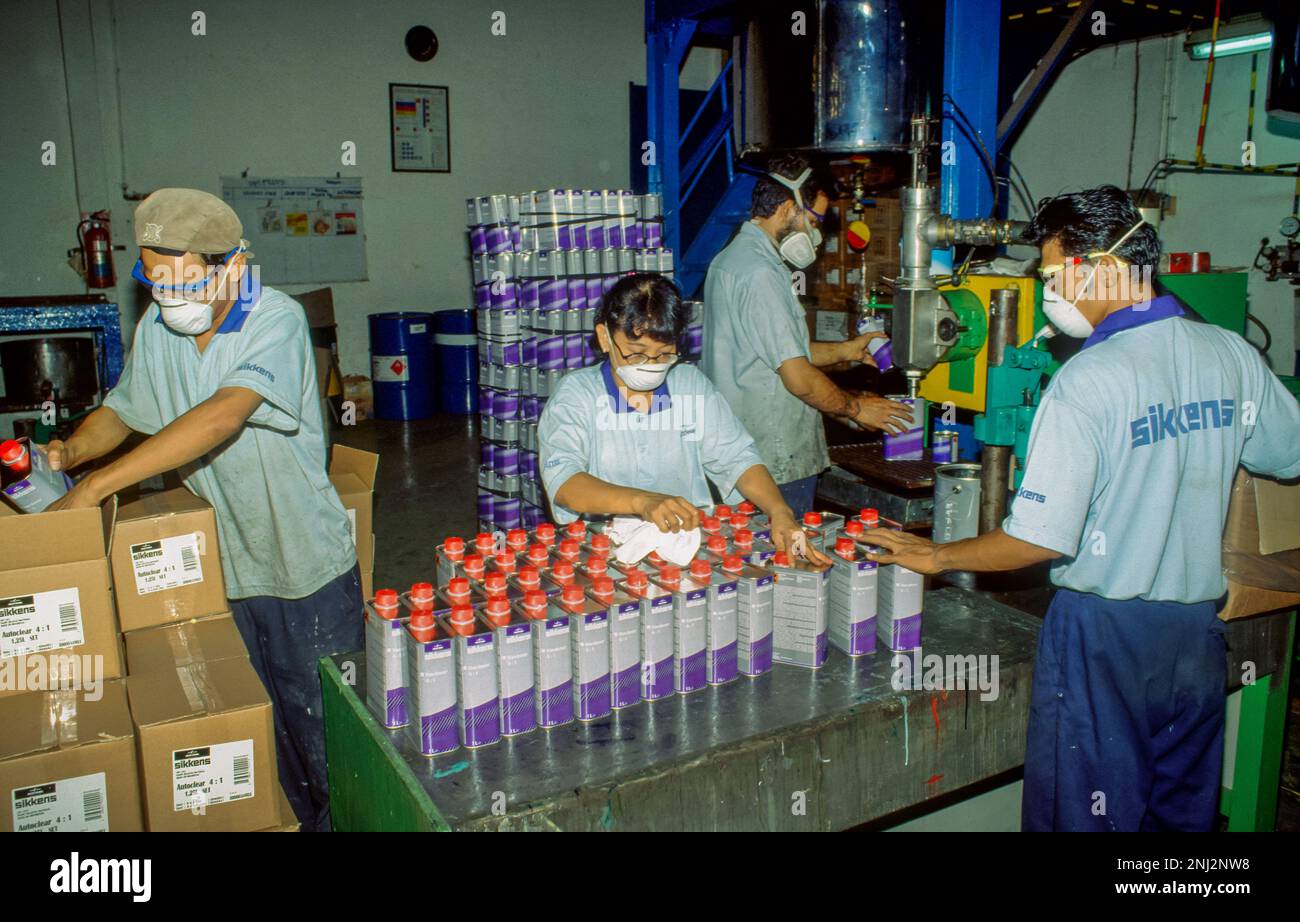 Indonesia, Jakarta. People work in the Dutch paint factory Sikkens ...