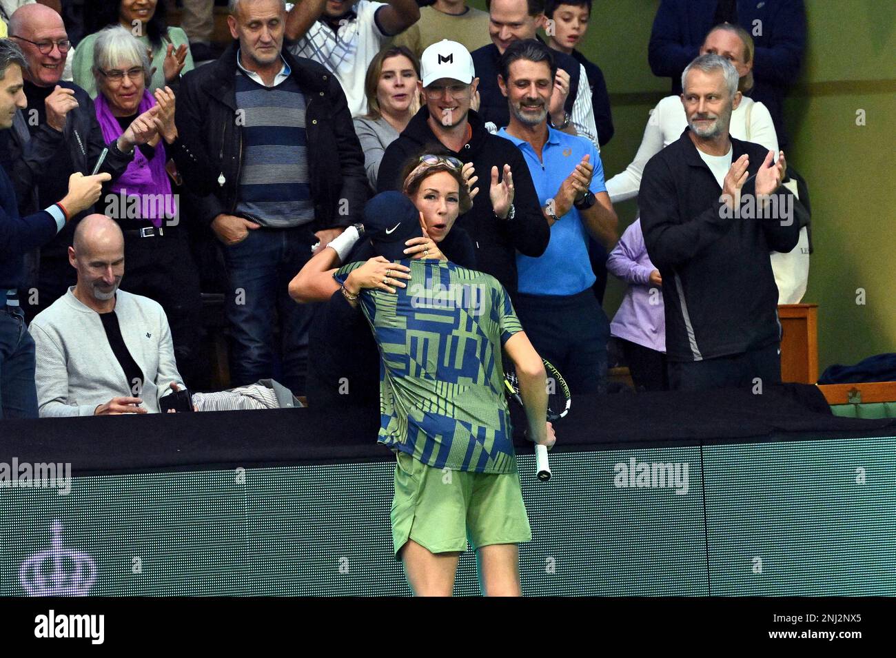 Denmark's Holger Rune hugs his mother Aneke after winning the final match against Greece's ...