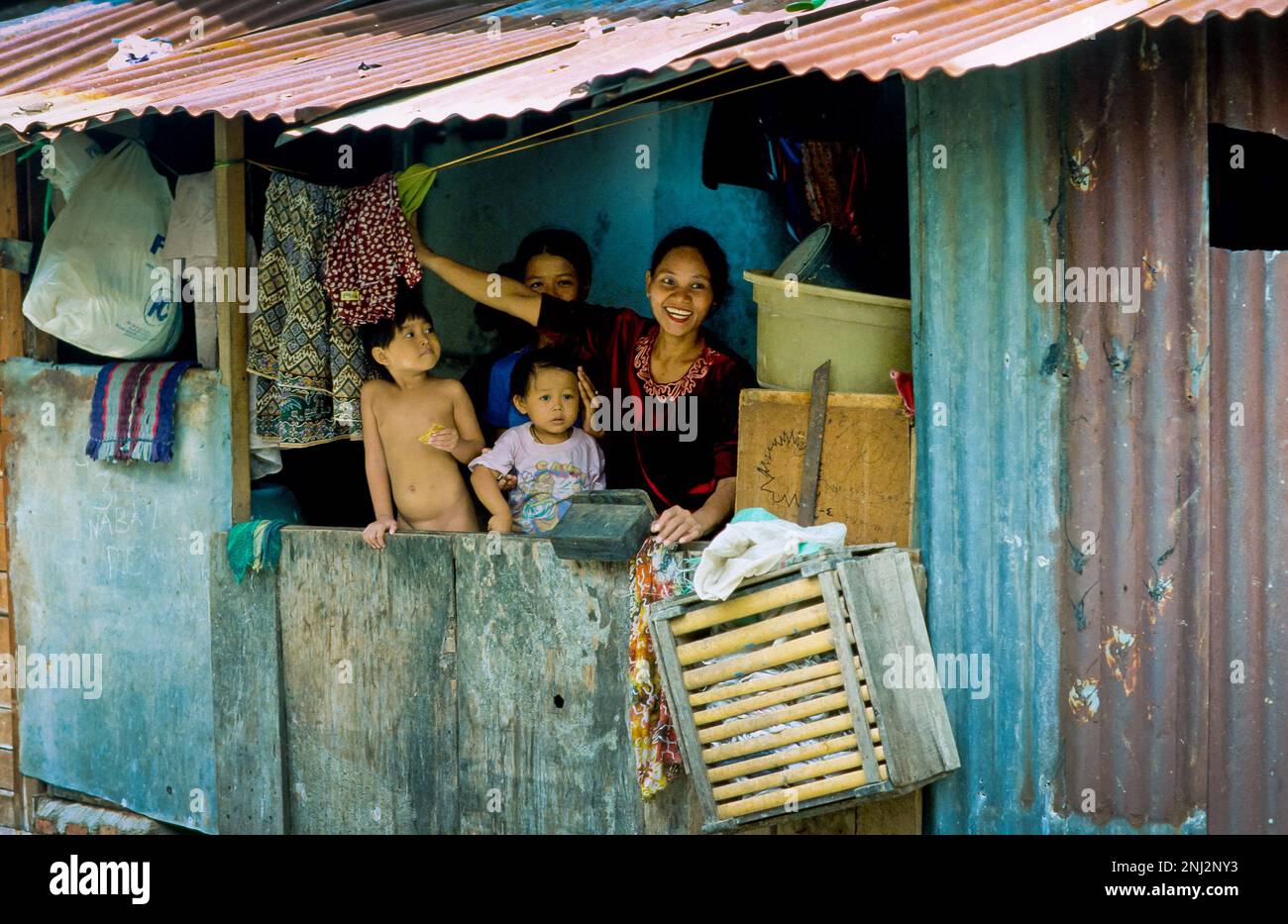 Indonesia, Jakarta. Family in a slum Stock Photo - Alamy