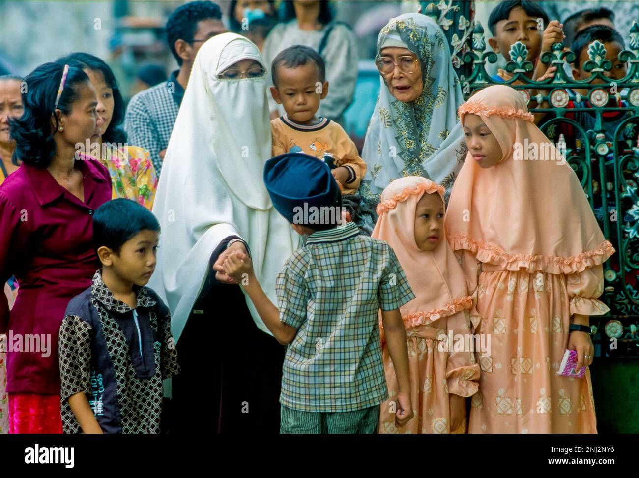 Indonesia, Yogyakarta. Family during Garebeg Syawal, a traditional ...