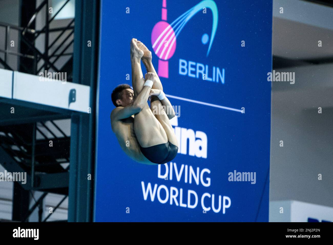 China's Yang Jian dives to win the men's high diving 10m event, during ...