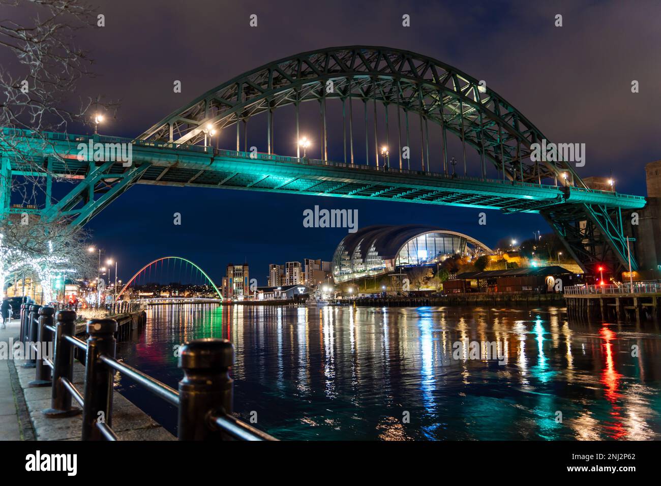 Newcastle upon Tyne, UK Quayside at night. showing the Tyne Bridge, The ...