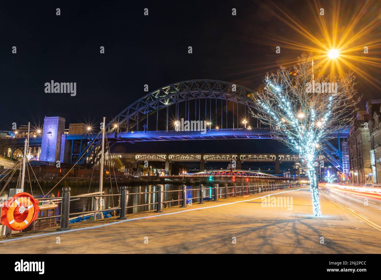Newcastle upon Tyne, UK Quayside at night. showing the Tyne Bridge ...