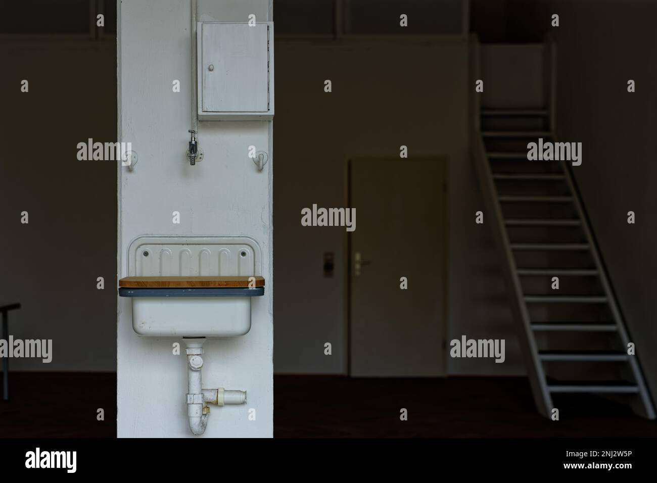 Empty artist studio with high white walls in Hanover Stock Photo - Alamy