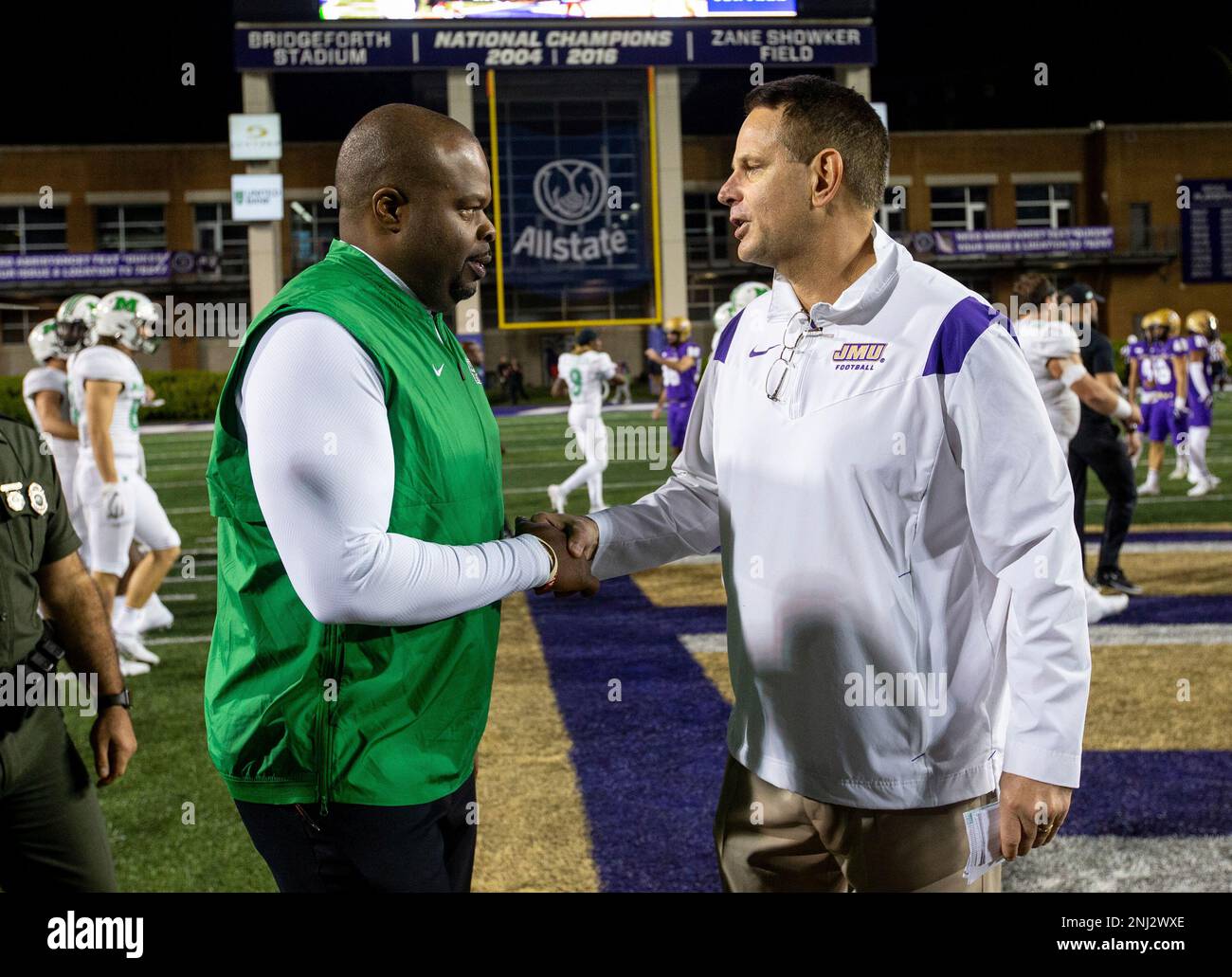 James Madison coach Curt Cignetti, right, congratulates Marshall coach ...