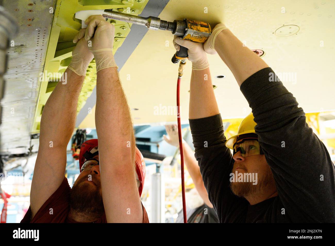Right, Evan Mallory and Cody Lee, 573rd Aircraft Maintenance Squadron ...