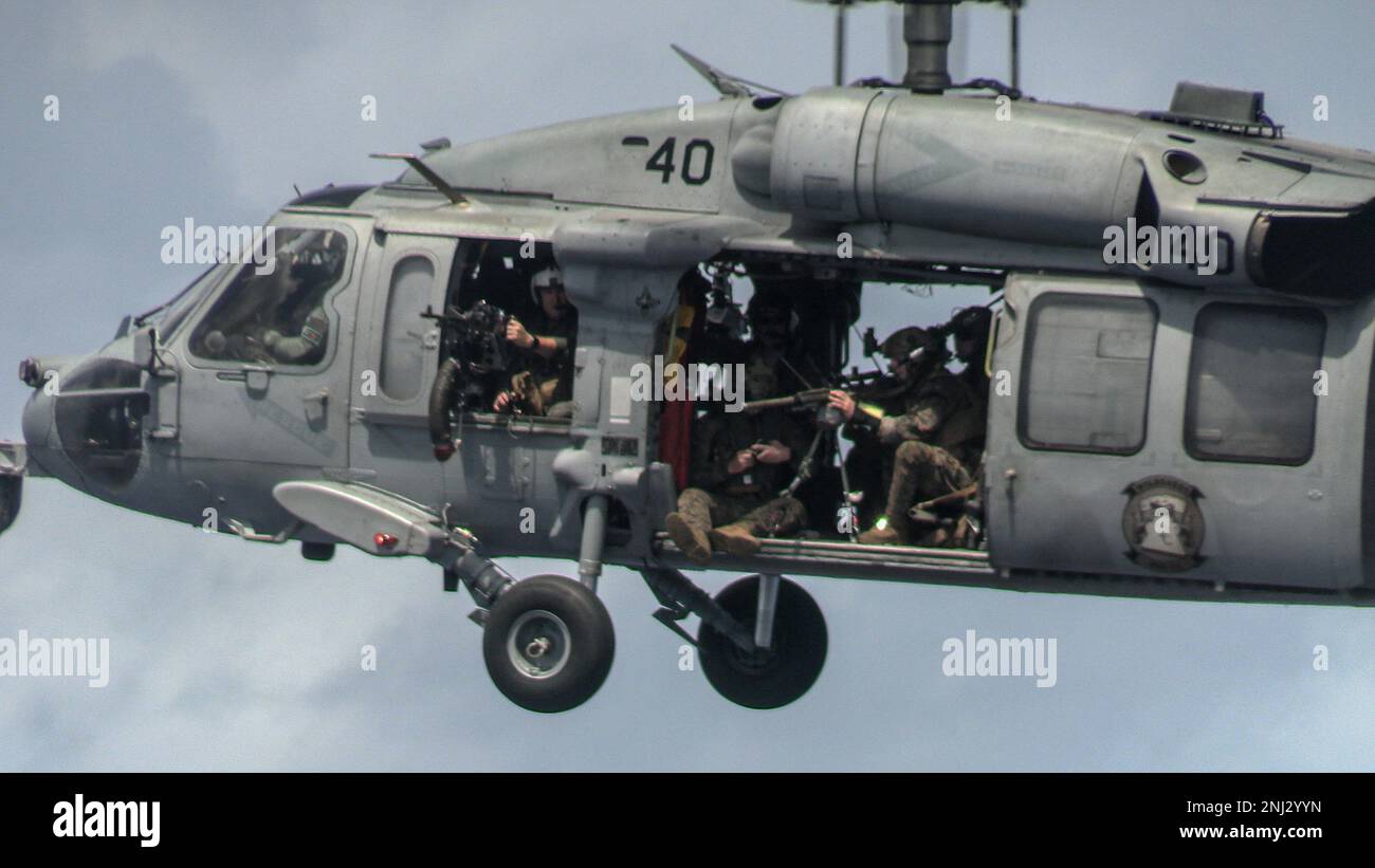A U.S. Marine Corps scout sniper with Battalion Landing Team 2/5, 31st ...
