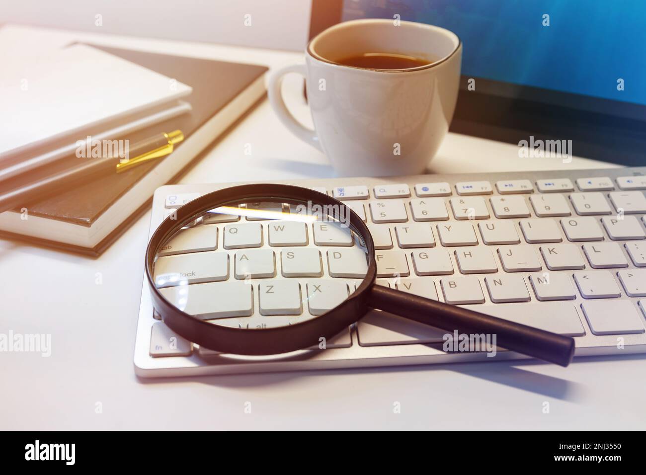 Magnifying glass computer keyboard search hi-res stock photography and ...