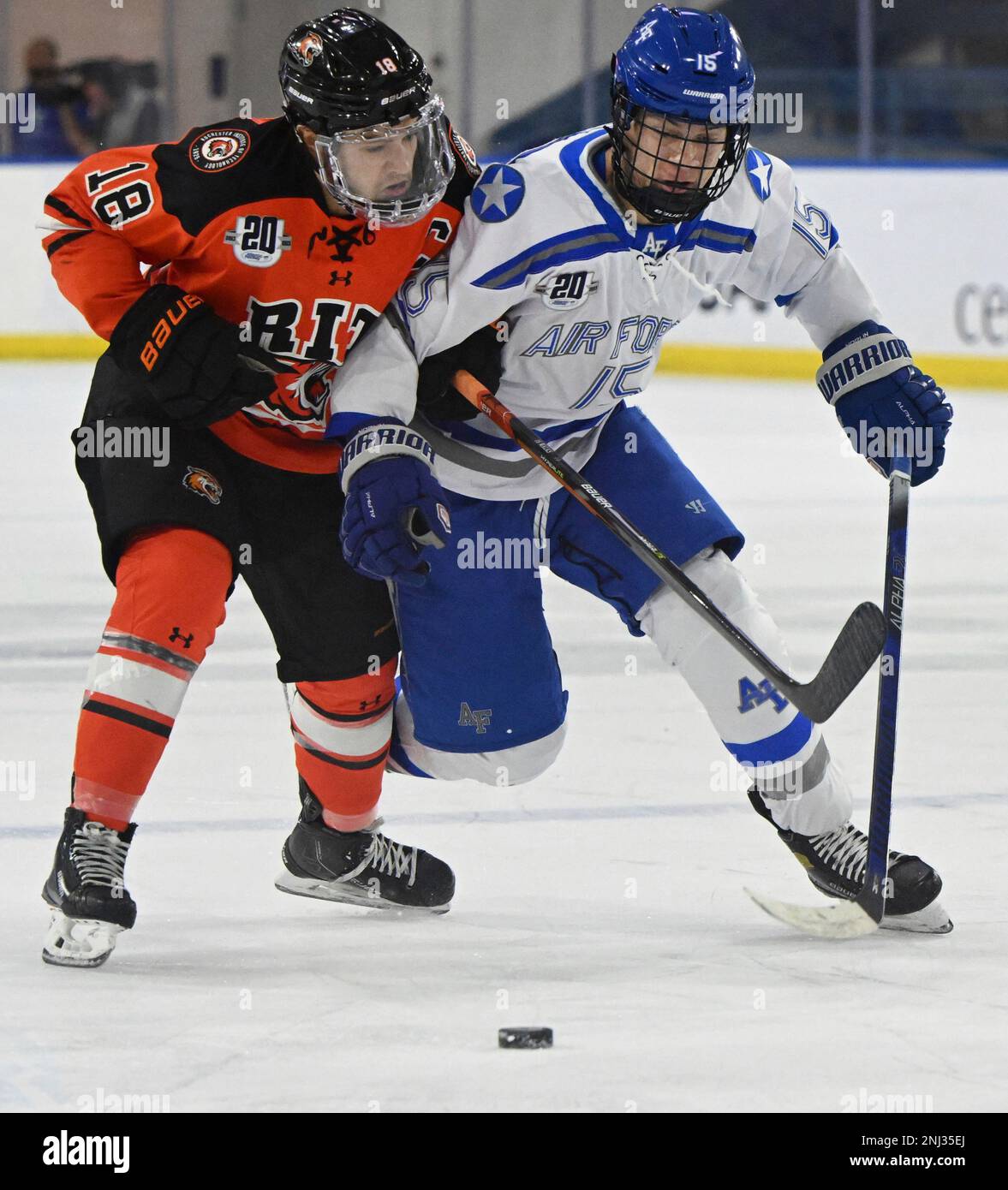 Air Force forward Bennett Norlin (15) battles RIT forward Kobe Walker ...