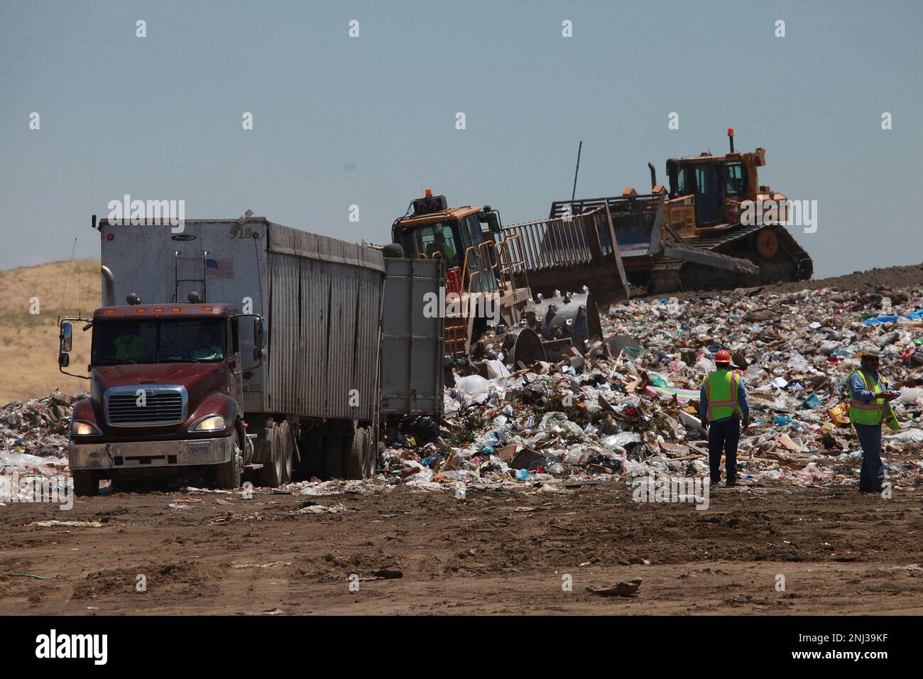 Tractors constantly move trash at Potrero Hills landfill in Suisun City ...