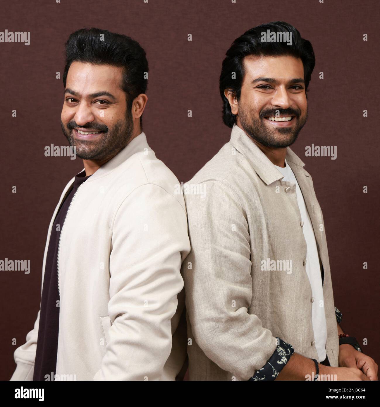 Indian actors N.T. Rama Rao Jr. and Ram Charan pose for a photograph at ...