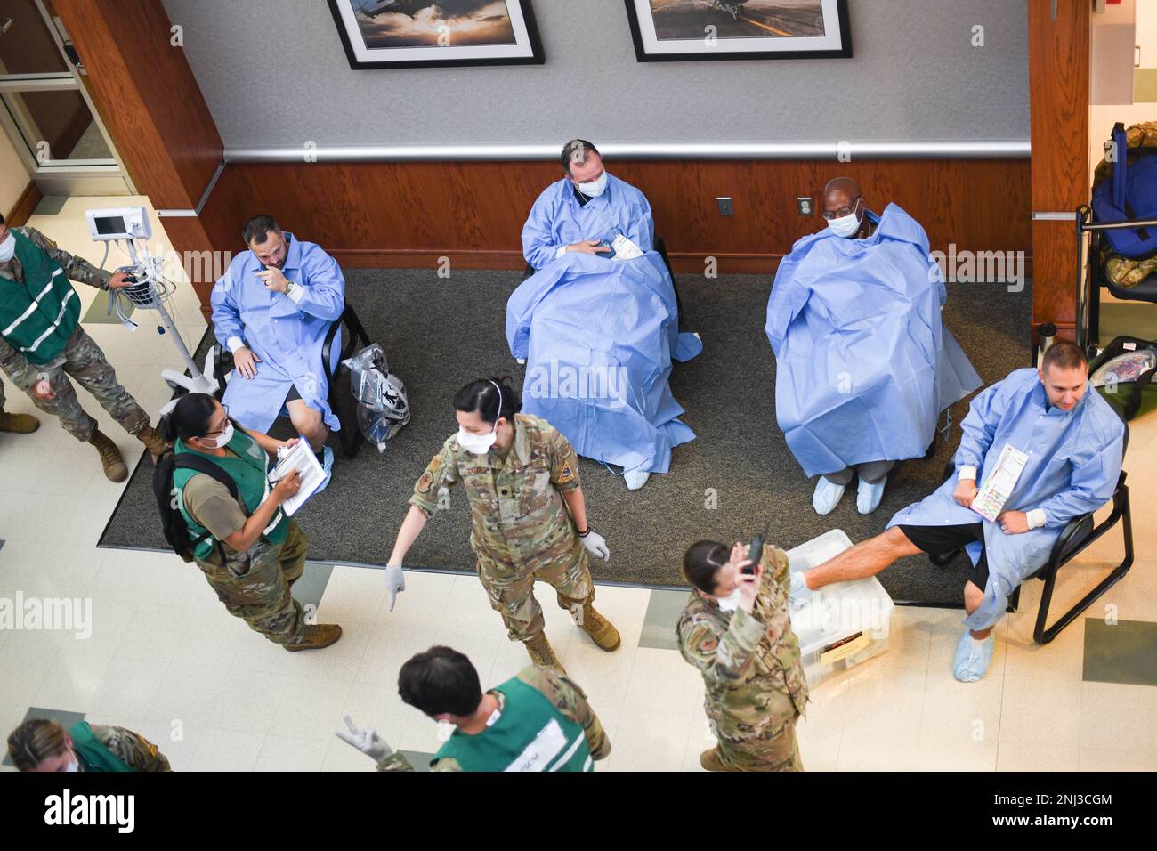 The 61st Medical Squadron bring patients into the clinic for further ...