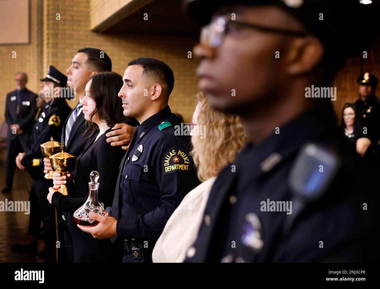 Dallas Police Officer Joshua Arellano (with wine) his sister Mia ...