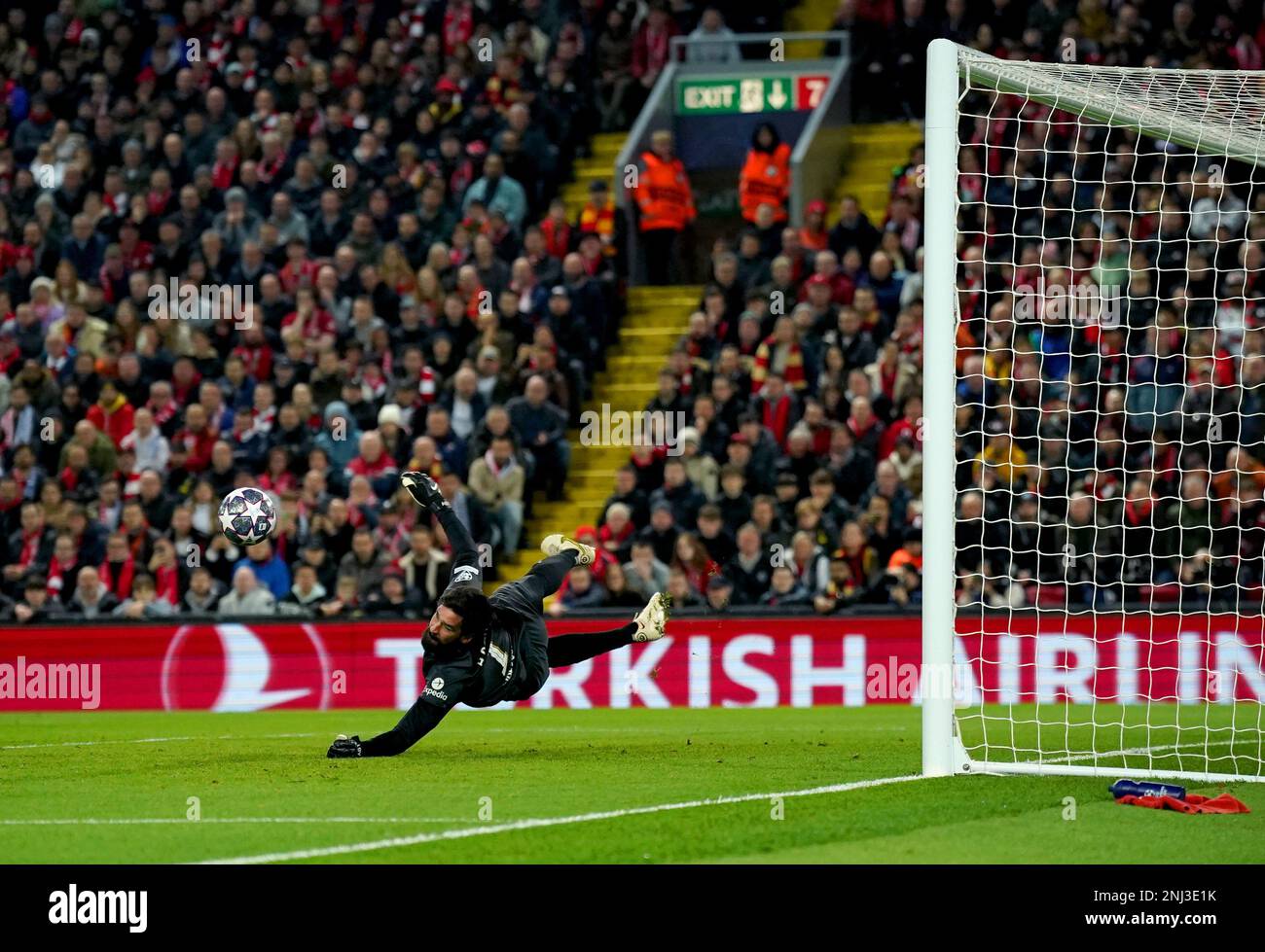 Liverpool goalkeeper Alisson Becker makes a save during the Champions ...
