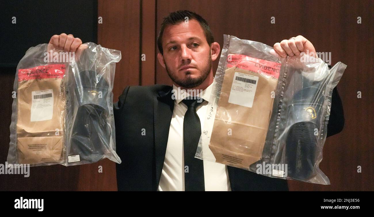 Kyle Becker, Warrant Specialist with the City of Waukesha Police, holds ...