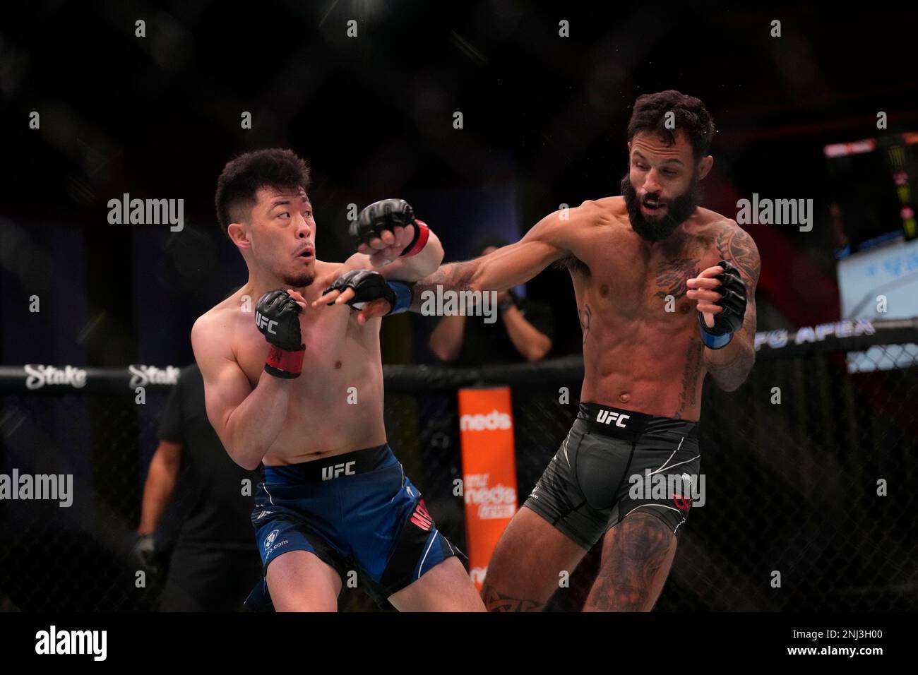 LAS VEGAS, NV - OCTOBER 15: (L-R) Mana Martinez punches Brandon Davis ...