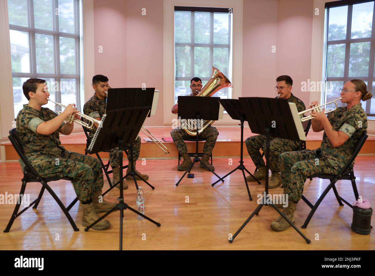 U.S. Marines with the 2nd Marine Division Band play the national anthem ...