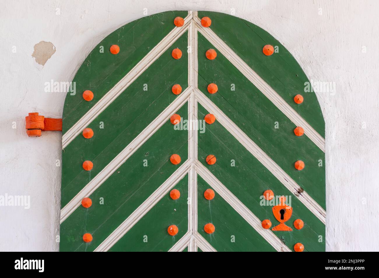 Ancient wooden green door, Tallinn Gate. Only preserved 17th century ...