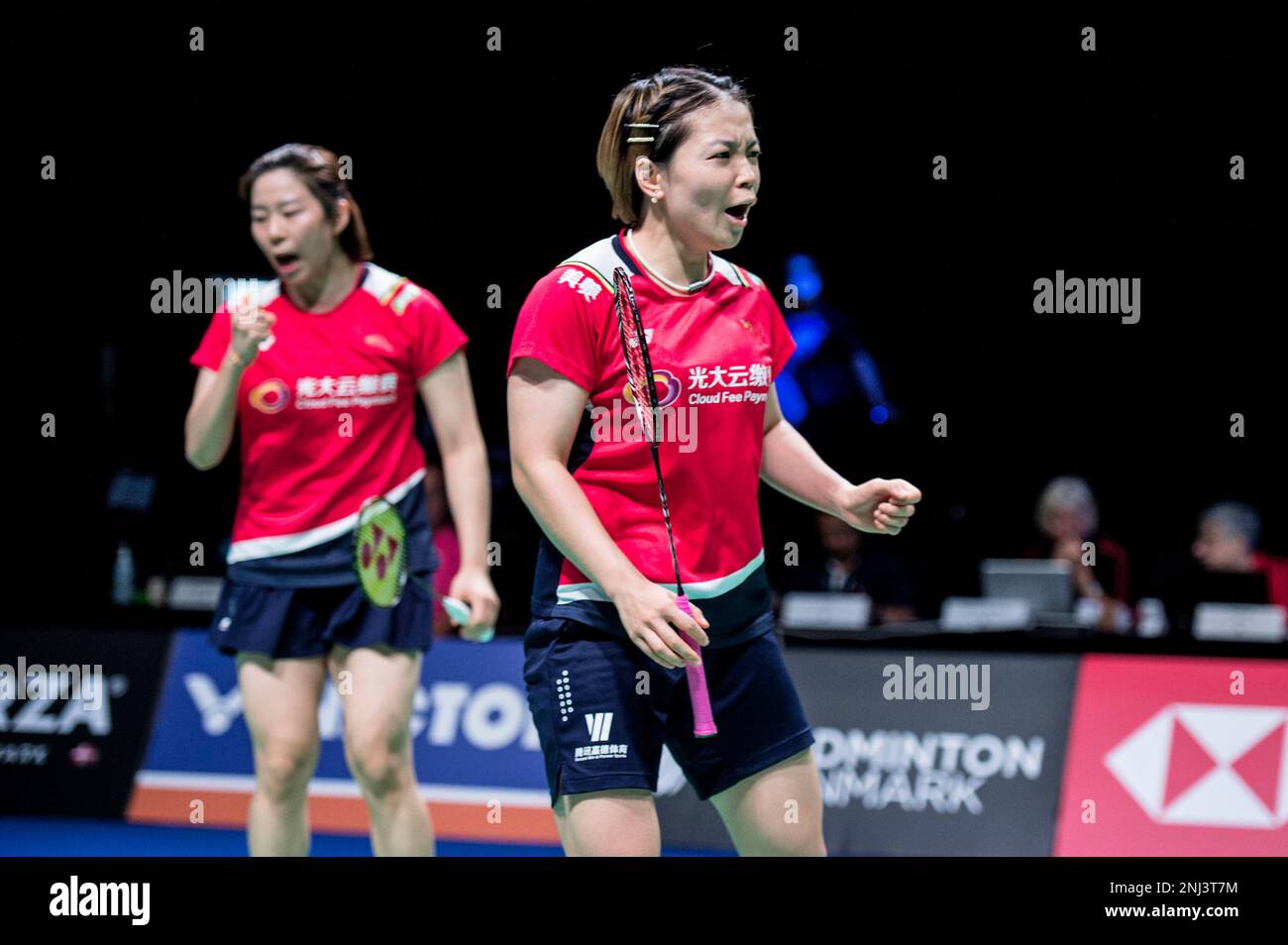 Chen Qing Chen and Jia Yi Fan from China react during their women's doubles match at the Denmark ...