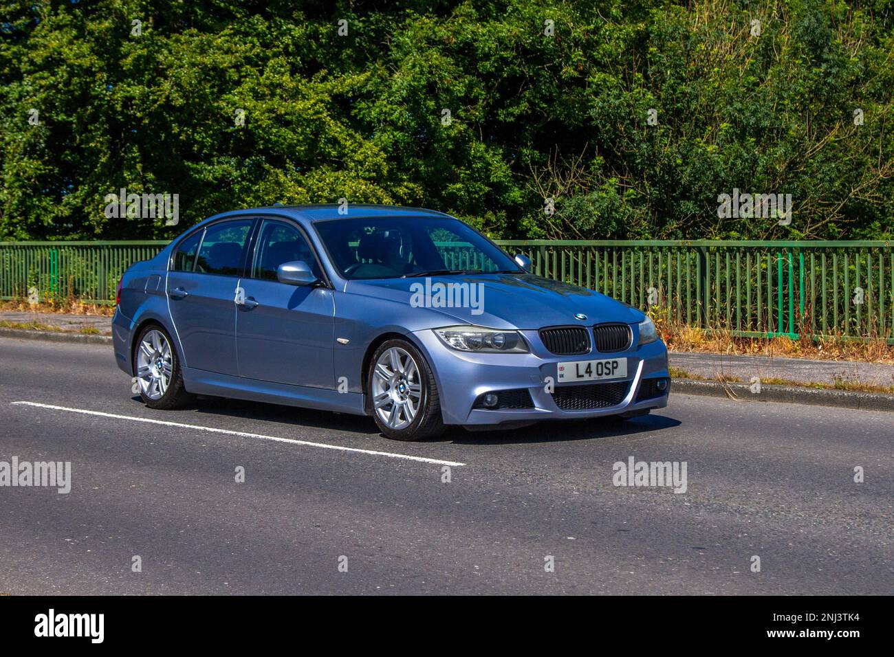 L4OSP BMW 2011 grey 320I M Sport; Vehicular traffic moving vehicles ...