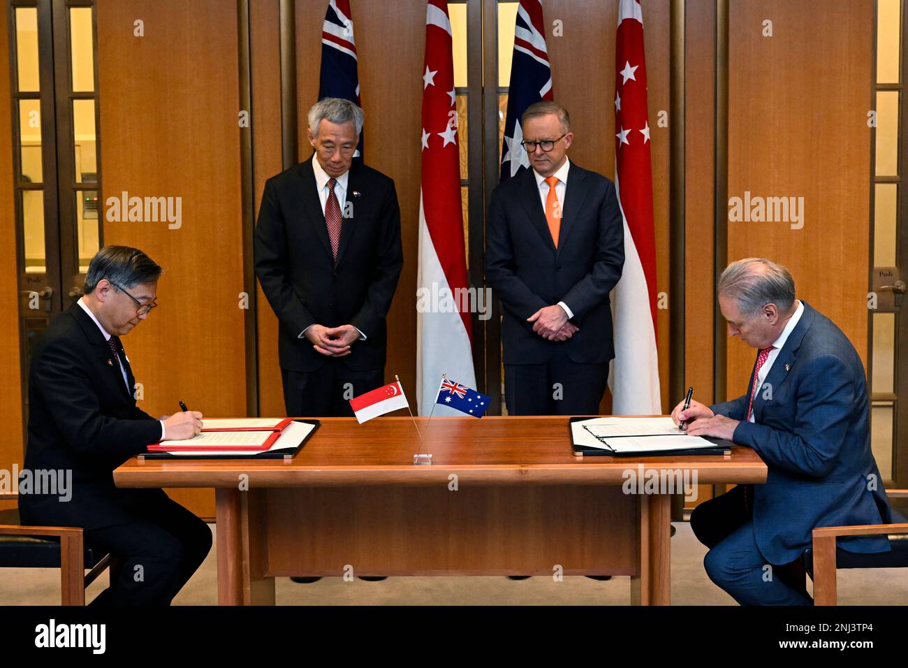 Prime Minister of Singapore Lee Hsien Loong, second left, and ...