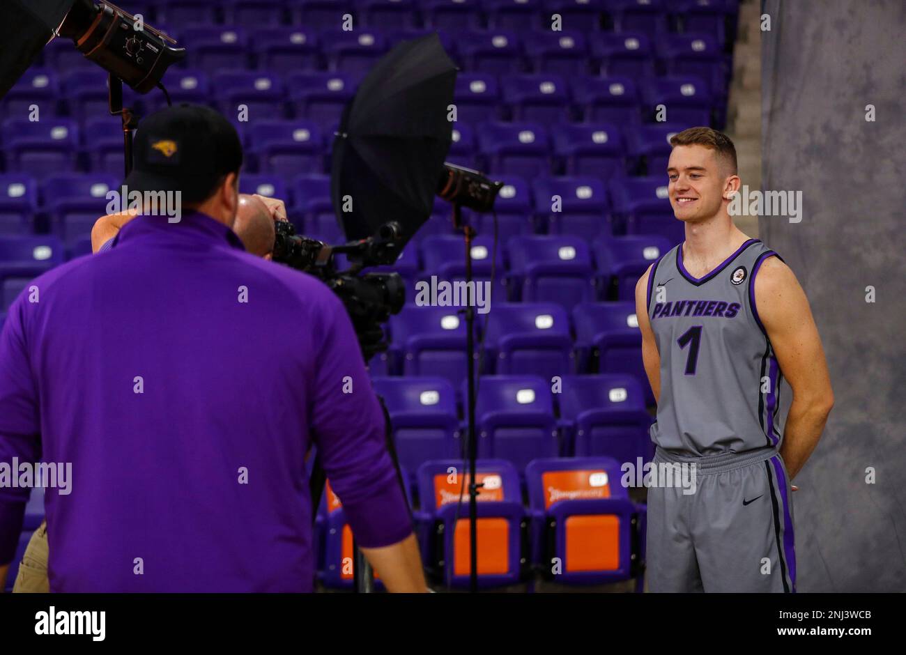 Northern Iowa forward Cole Henry, right, poses for a photo during the ...