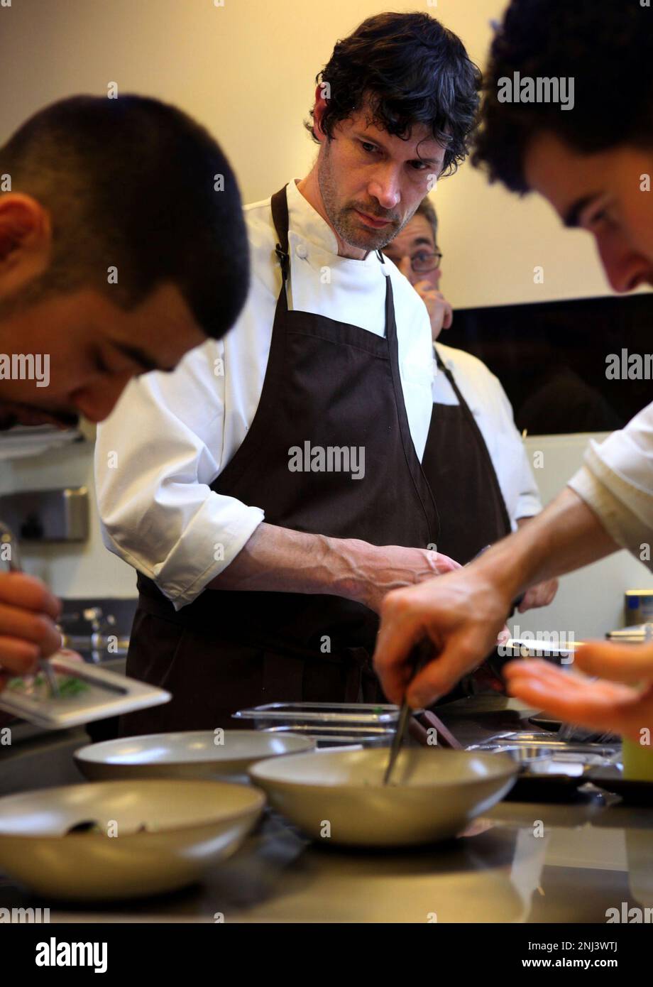 Four-star chef Daniel Patterson of Coi keeps watches his chefs while ...