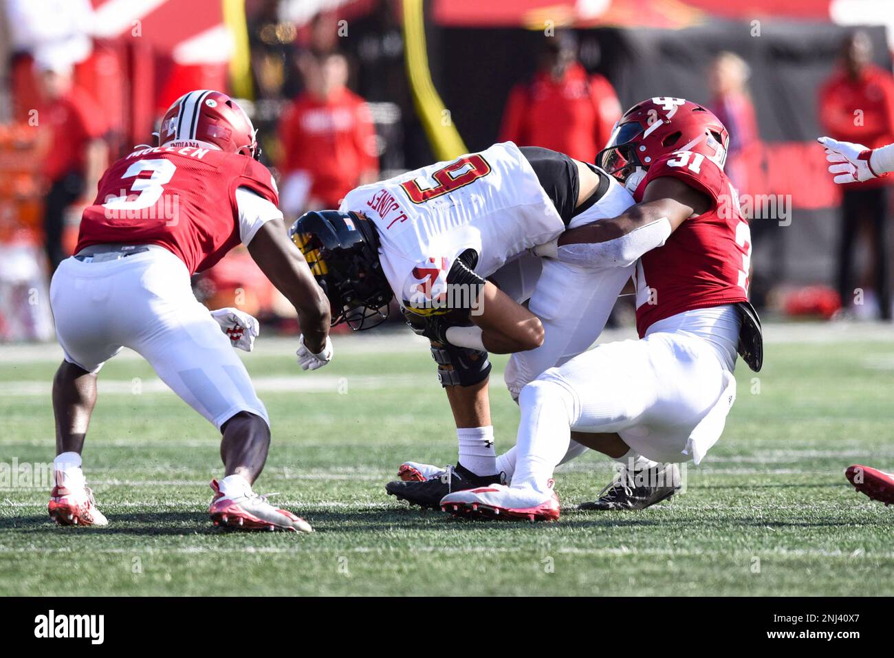 BLOOMINGTON, IN - OCTOBER 15: Indiana DB Bryant Fitzgerald (31) tackles ...