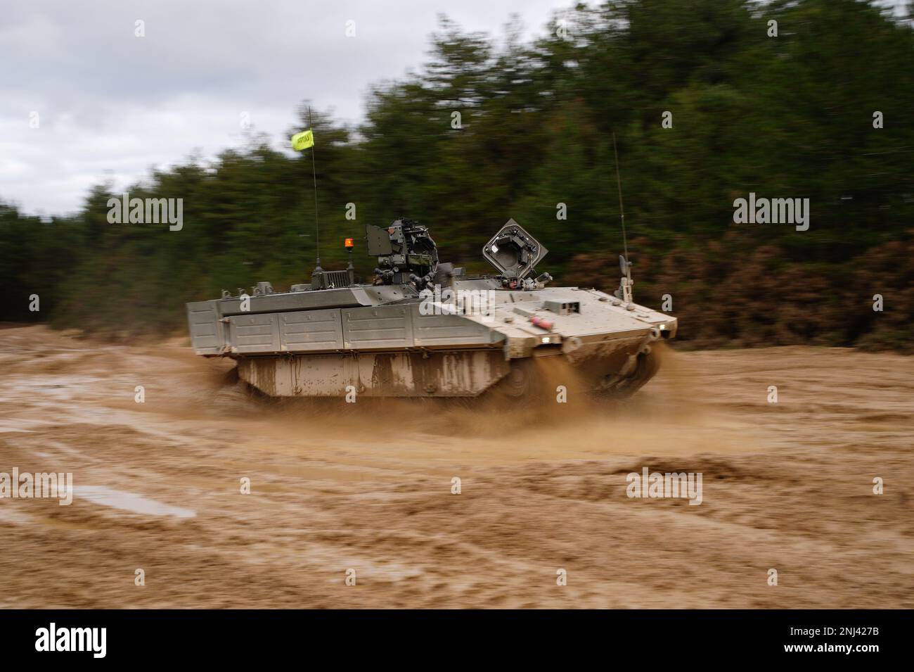 An Ajax Ares tank, an armoured personnel carrier, on the training range ...