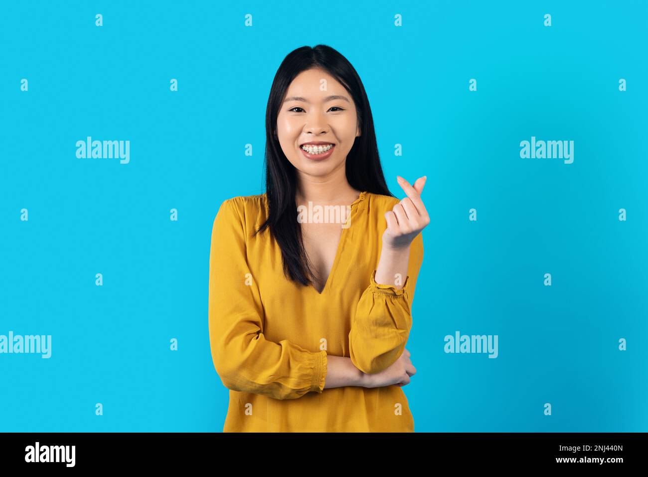 Japanese gesture for money hi-res stock photography and images - Alamy