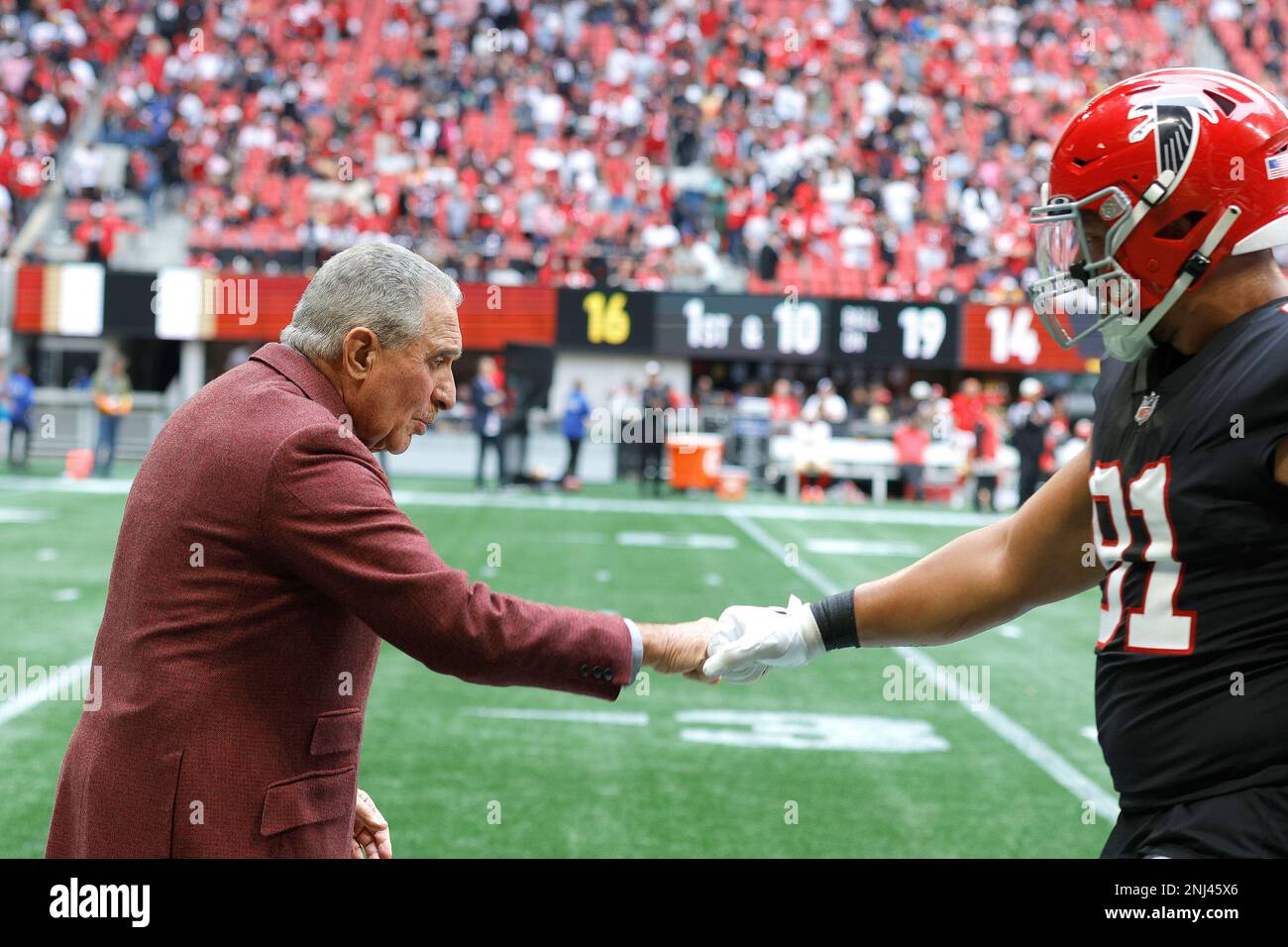 ATLANTA, GA - OCTOBER 16: Falcons team owner Arthur Blank fist bumps ...