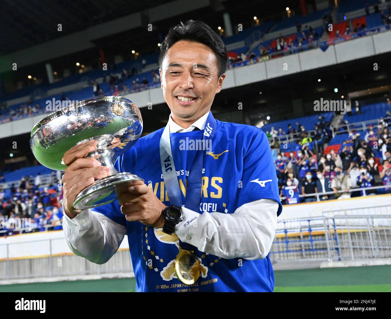 Ventforet Kofu's coach holds a trophy as Kofu wins Emperor's Cup JFA 102nd Japan Football ...