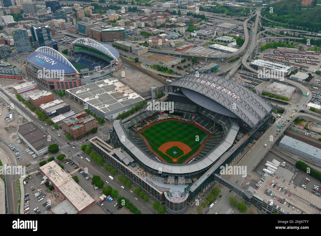 A general overall aerial view of T-Mobile Park (foreground) and Lumen ...