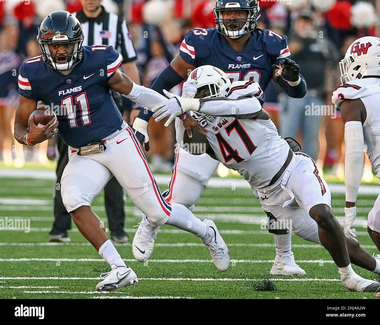 Liberty's Johnathan Bennett (11) runs the ball past Gardner-Webb's Ty ...