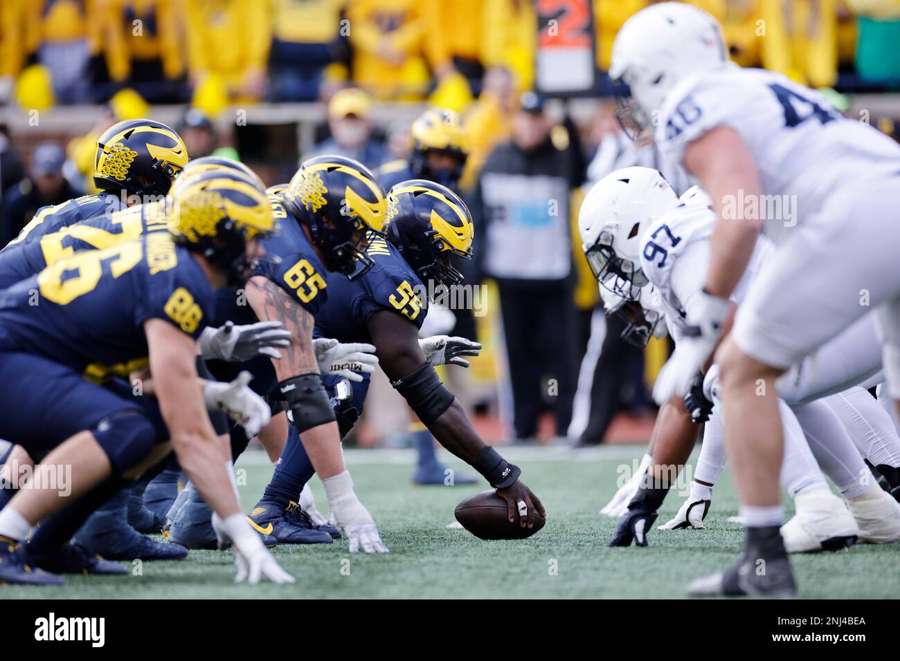 ANN ARBOR, MI - OCTOBER 15: Michigan Wolverines face off at the line of ...