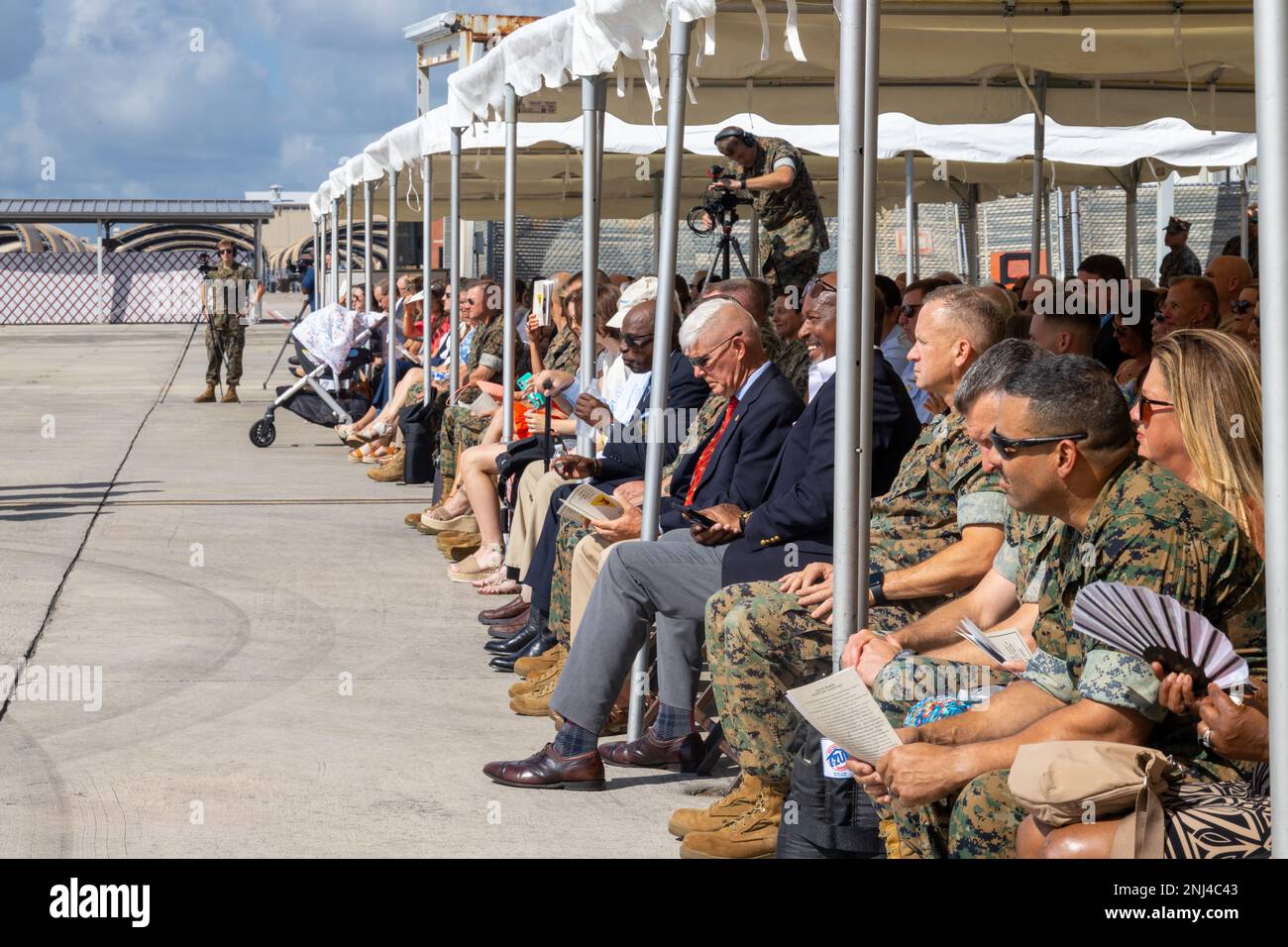 Guests listen as U.S. Marine Corps Col. Mikel Huber, outgoing ...