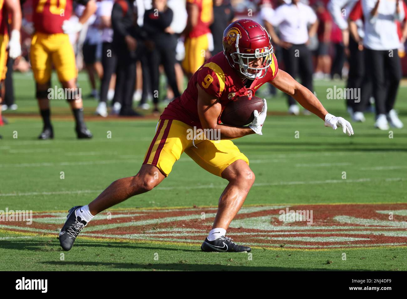 USC Trojans wide receiver Michael Jackson III (9) runs upfield wth a ...