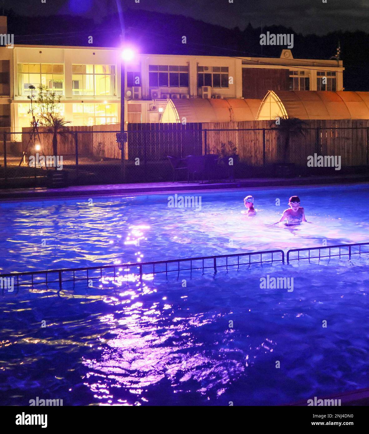 Visitors to glamping & Port Yui enjoy swimming in the renovated former ...