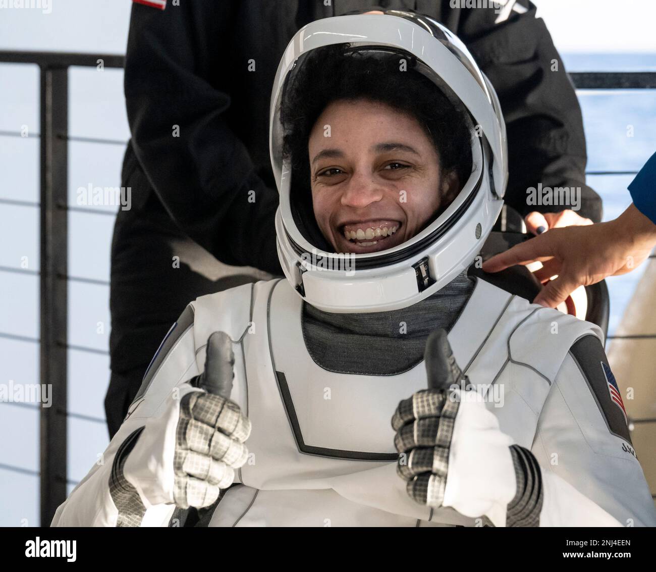NASA astronaut Jessica Watkins is helped out of the SpaceX Crew Dragon ...