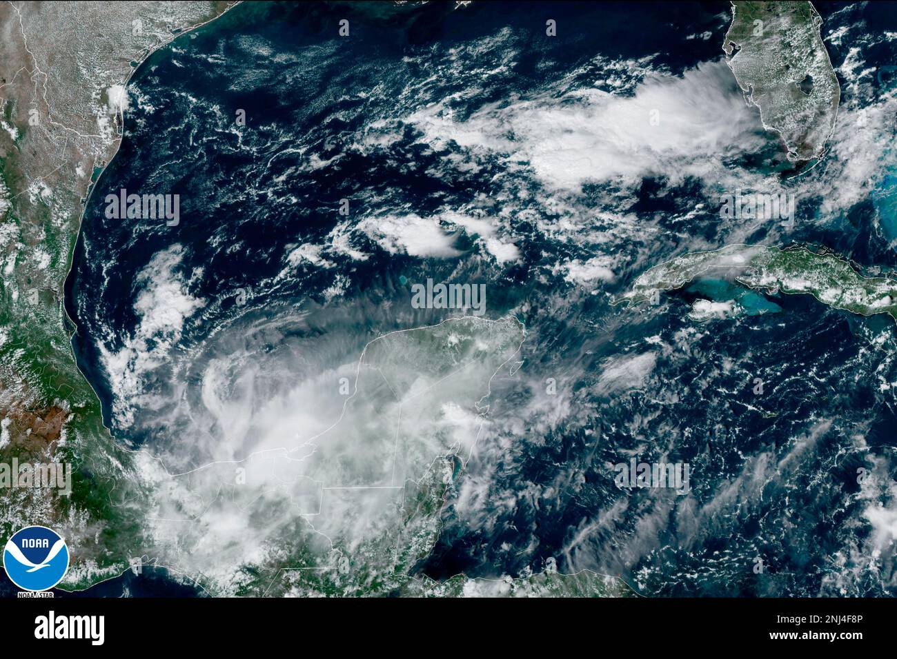 This satellite image taken at 2:16pm ET and provided by NOAA shows ...