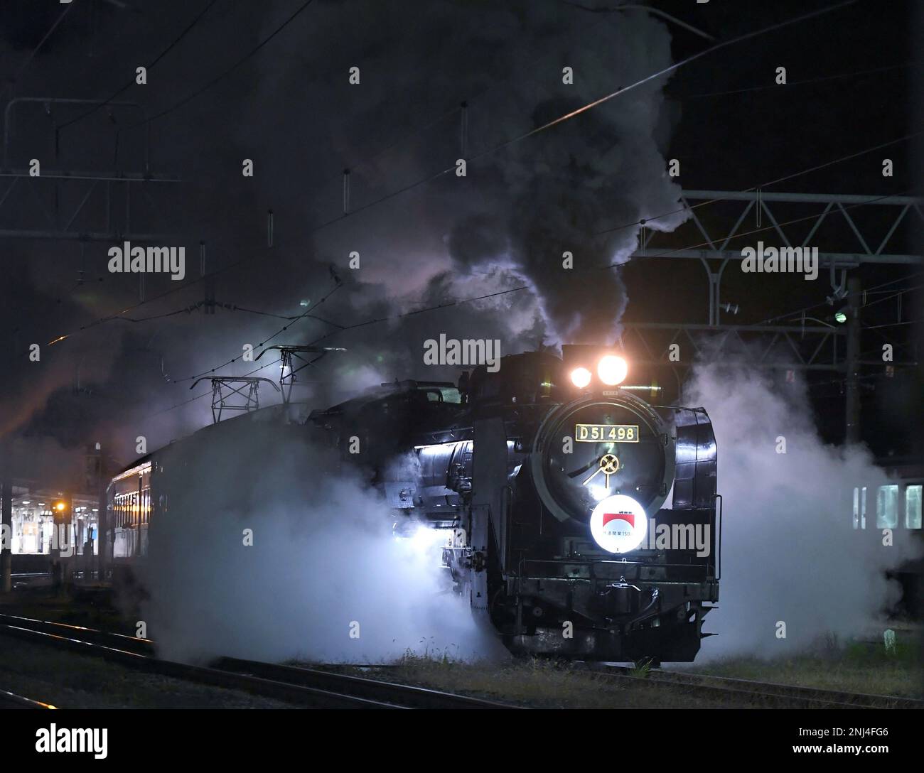 A special SL( steam locomotive) train leaves Minakami Station, Gunma ...
