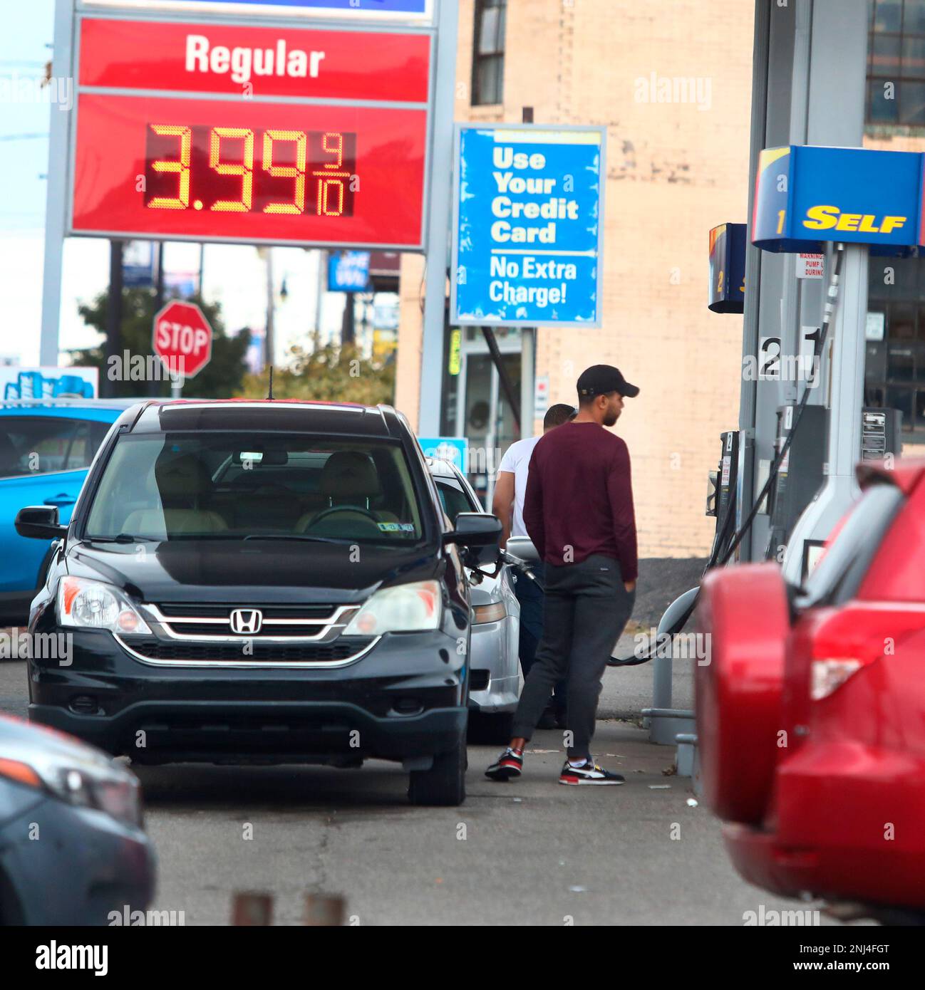 People refuel at Craig's Food Mart in Hazleton, Penn., on Friday, Oct ...