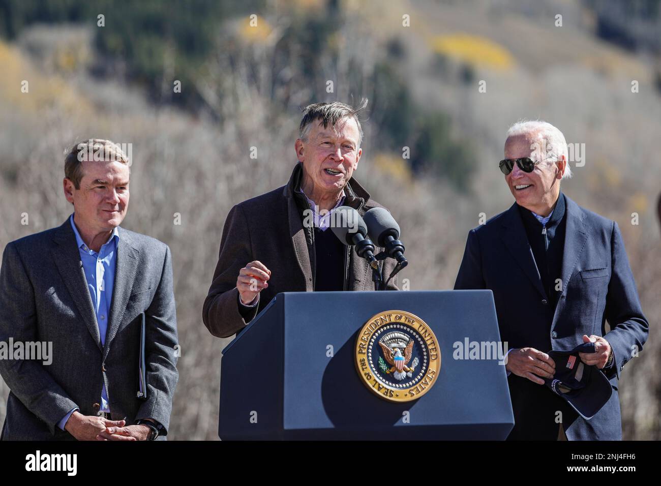 Colorado Sen. John Hickenlooper speaks during the signing of the Camp ...