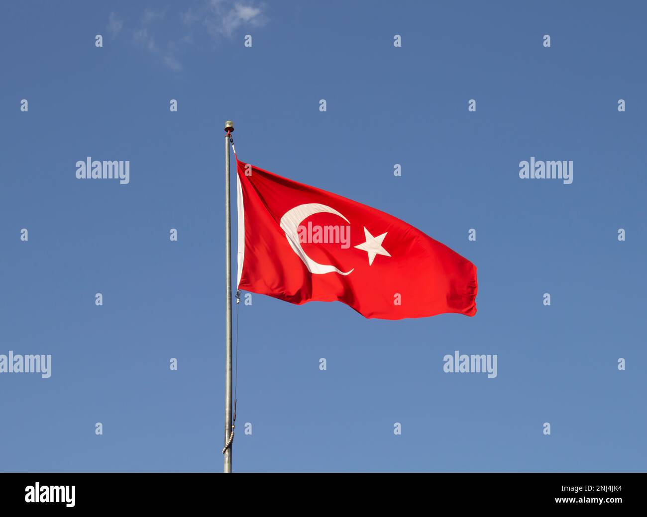 Turkish flag waving in a clear sky. red white and crescent and star ...