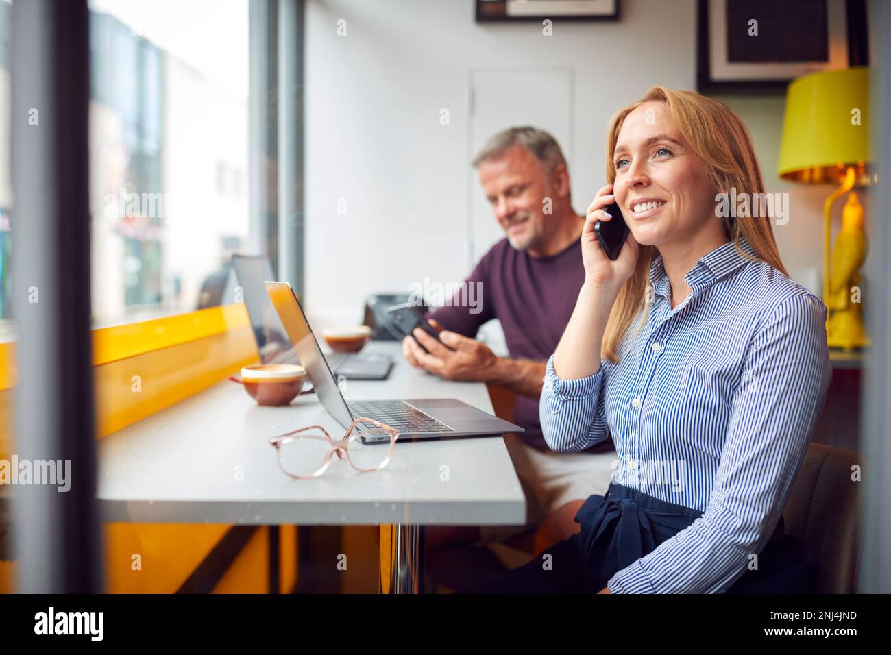 Business woman making call drinking hi-res stock photography and images ...